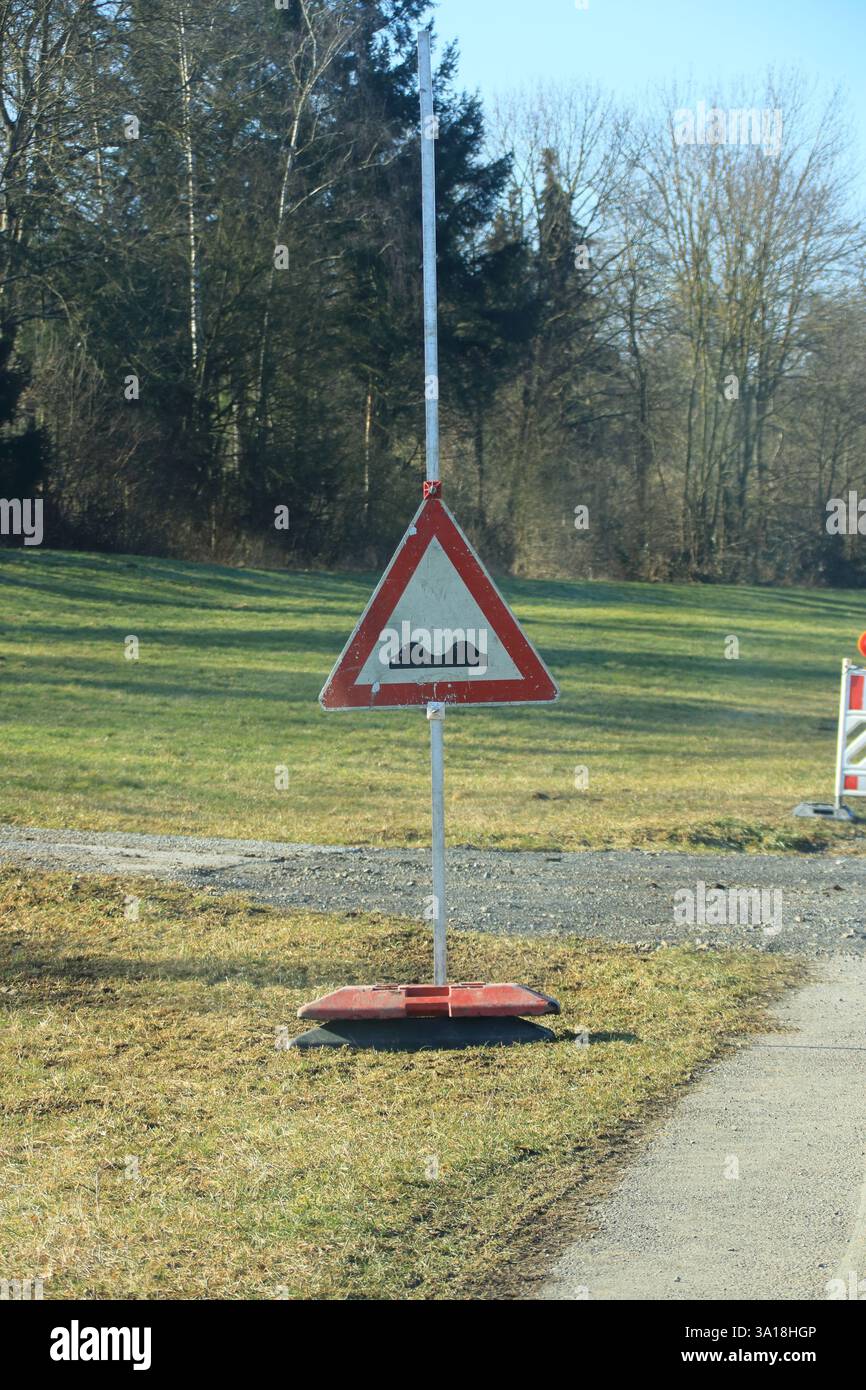 Traffic sign for an uneven road in front of a construction site Stock ...