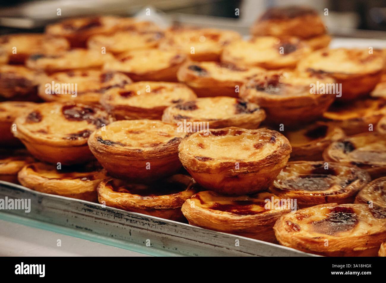 Traditional Portuguese dessert pasteis de nata, served fresh in Lisbon ...