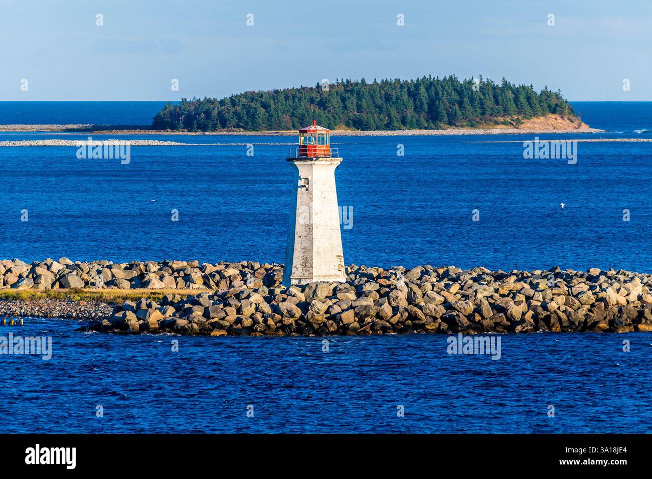 A view towards a lighthouse in the estuary leaving Halifax, Nova Scotia ...