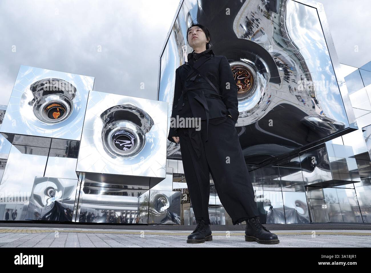 Japanese media artist Yoichi Ochiai poses on March 7, 2025, in front of Signature Pavillion ...