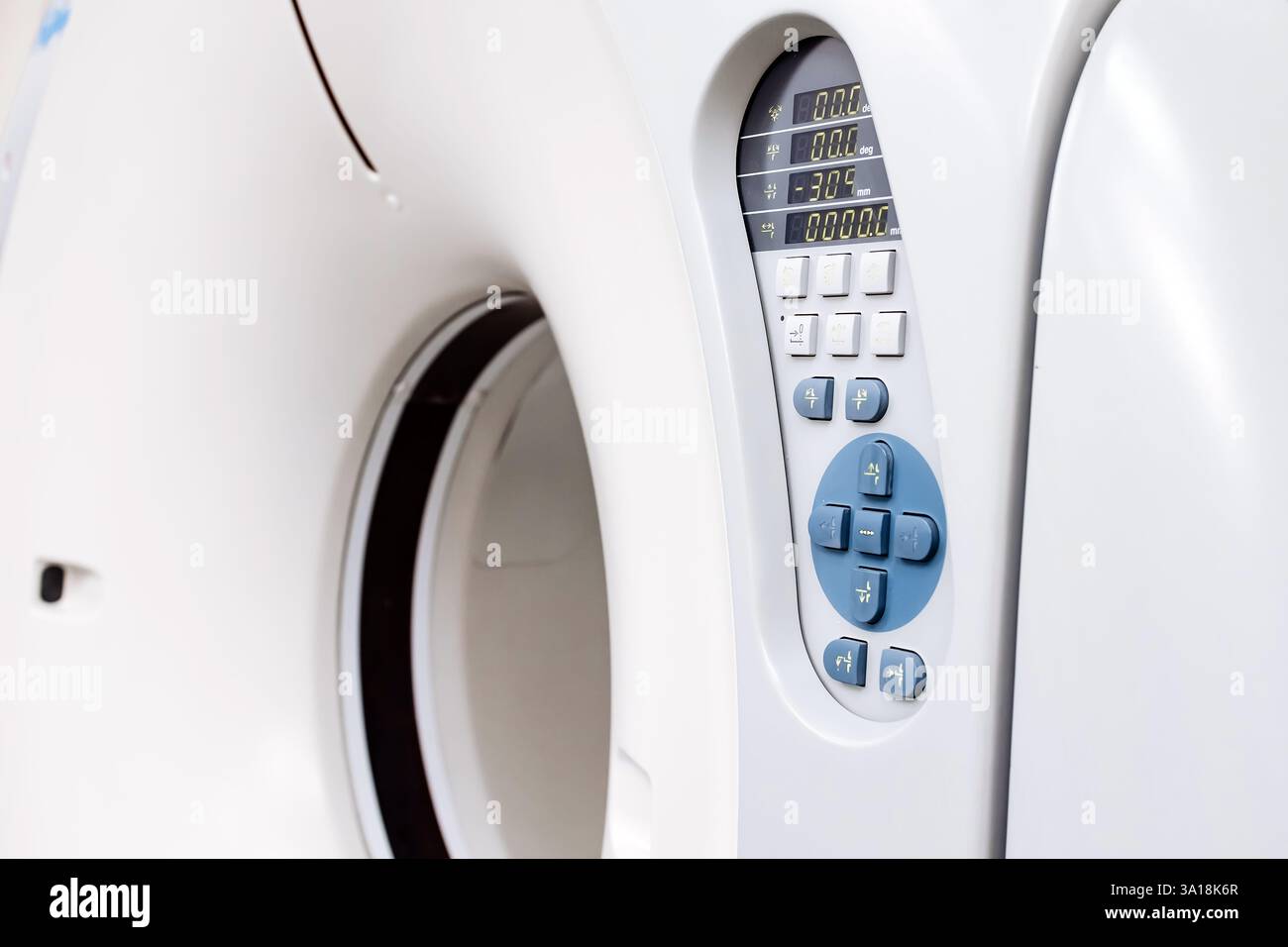 An MRI machine is positioned in a hospital, showcasing advanced imaging technology. This ...