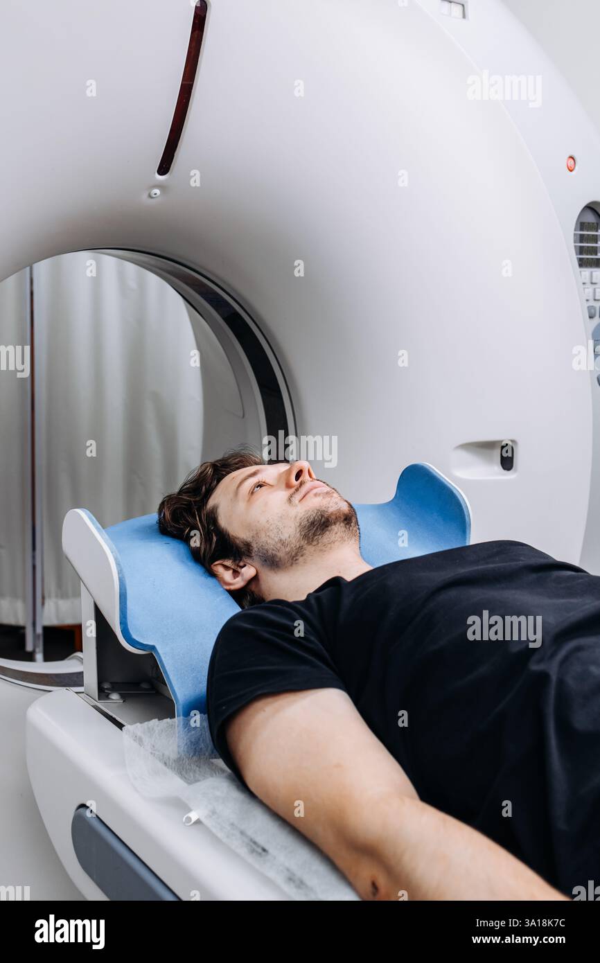 An MRI machine is positioned in a hospital, showcasing advanced imaging technology. This ...