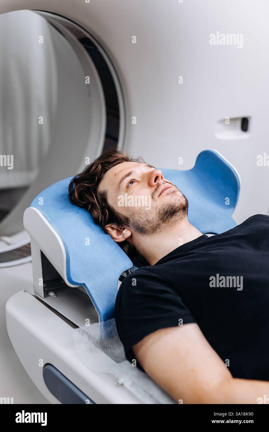 An MRI machine is positioned in a hospital, showcasing advanced imaging technology. This ...