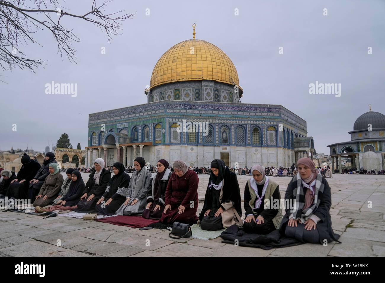 Muslim worshippers perform Friday prayers at the Al-Aqsa Mosque ...