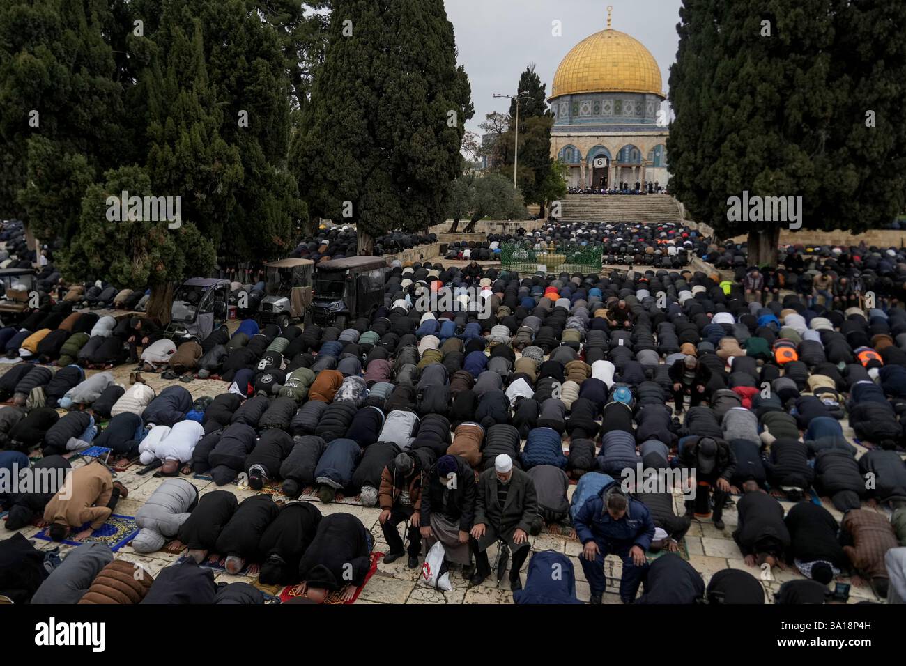 Muslim worshippers perform Friday prayers at the Al-Aqsa Mosque ...