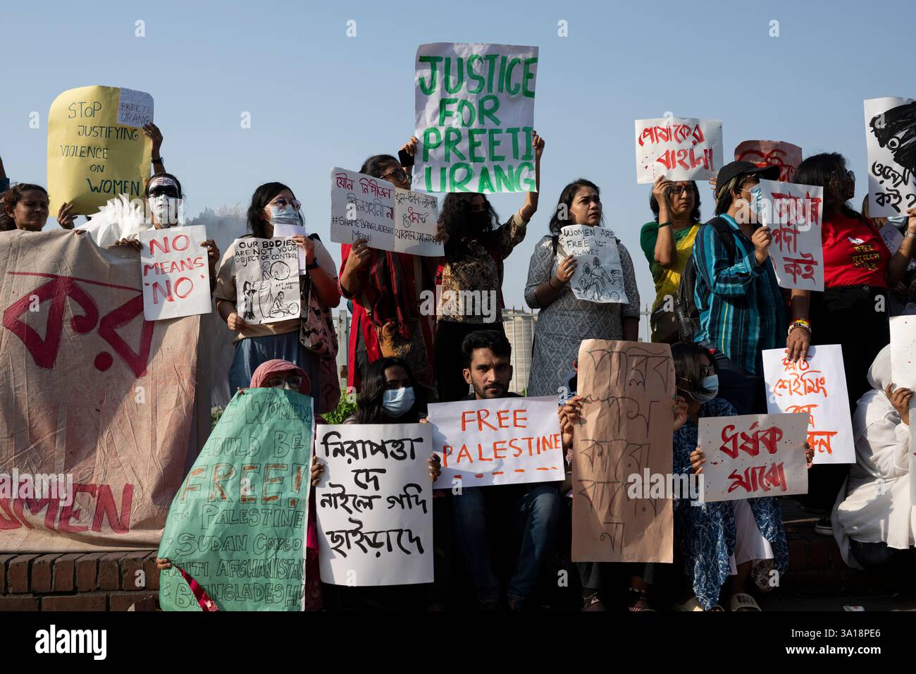 Activists hold placards to protest against countrywide rape, harassment ...