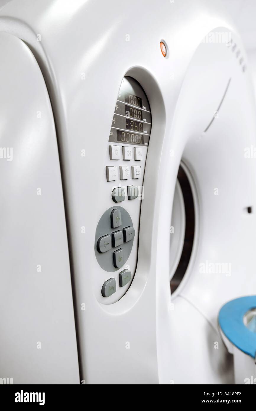 An MRI machine is positioned in a hospital, showcasing advanced imaging technology. This ...