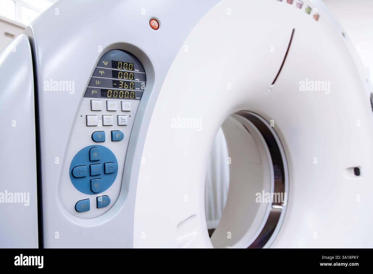 An MRI machine is positioned in a hospital, showcasing advanced imaging technology. This ...