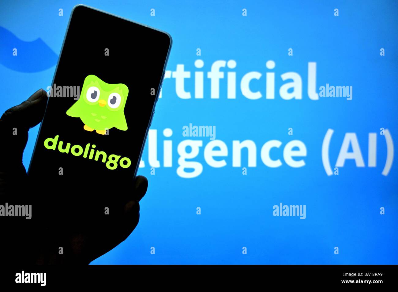 In this photo illustration, a Duolingo logo is seen displayed on a ...