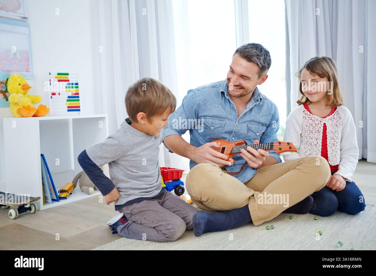 Home, dad and children with guitar for playing, sound track and bonding ...