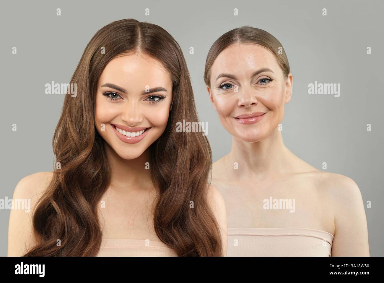 Attractive women on white background. Young and mature adult female ...