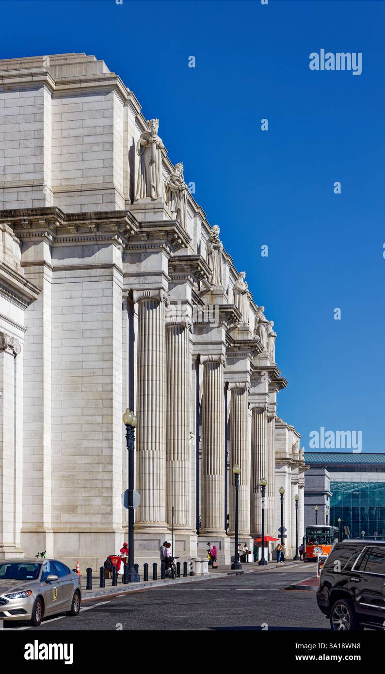 Union Station’s central pavilion is a triple arch surrounded by ionic columns supporting statues ...