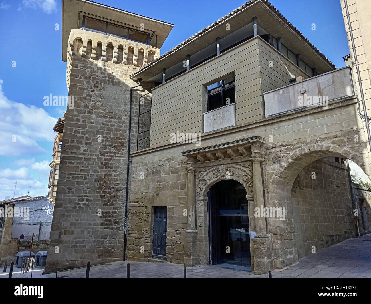 Museum building in Haro, Spain, combining a medieval stone tower with ...