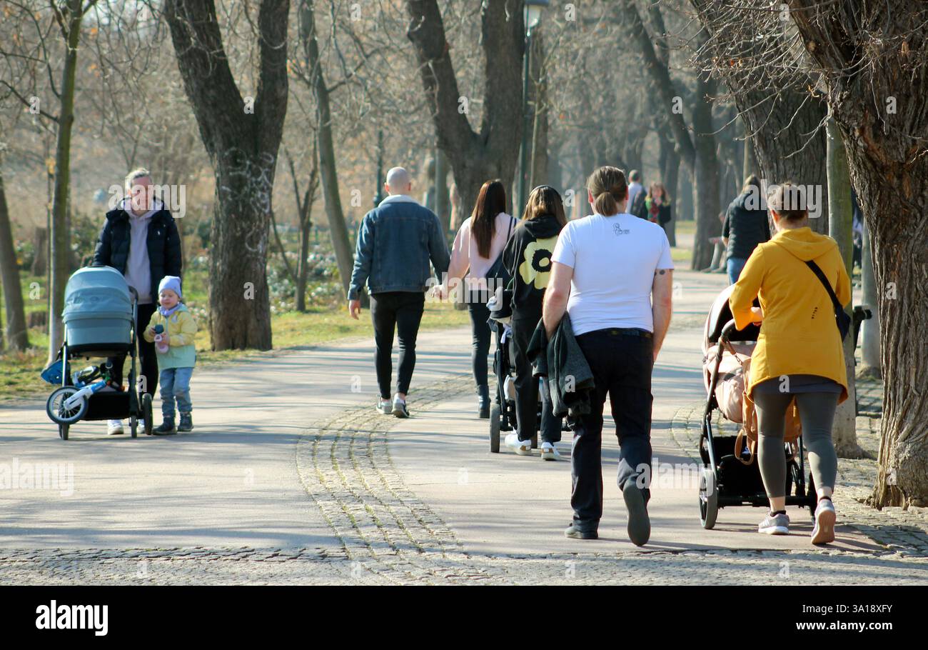 People enjoy the warm spring weather in Letenske sady (park) in Prague ...