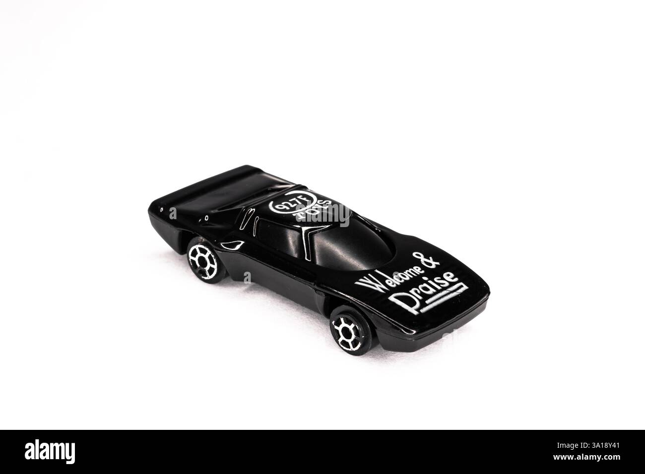Retro toy car with dark window tint, black sport car isolated on white ...