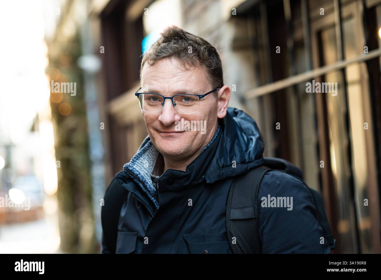 City portrait of a 46 yo white malen, Brussels old town, Belgium. March ...