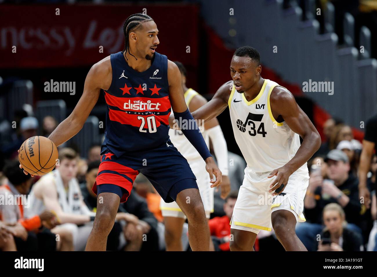 Washington Wizards forward Alex Sarr (20) handles the ball against Utah ...