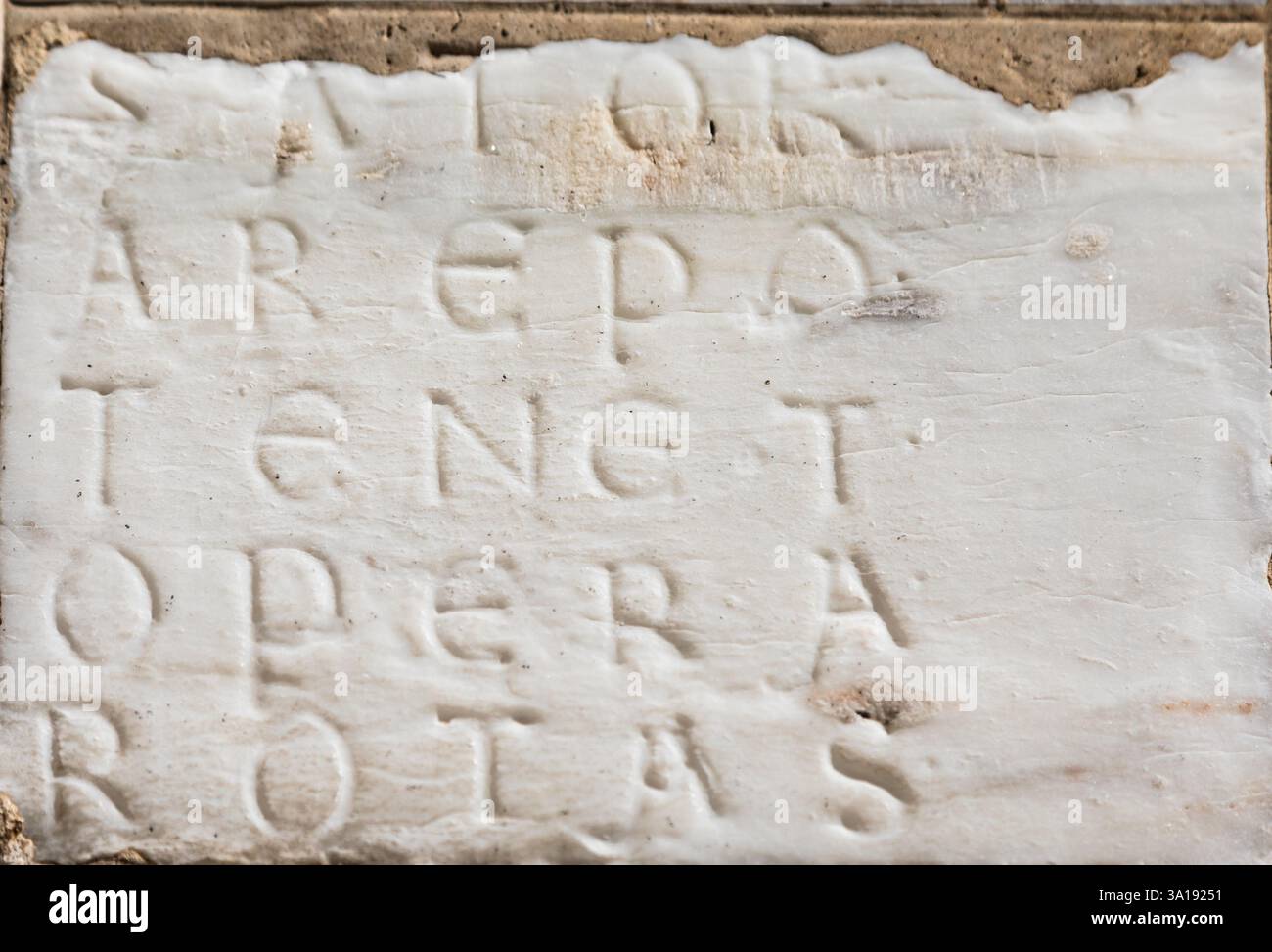 Facade of Siena Cathedral, Italy. The magic Sator square, esoteric word ...