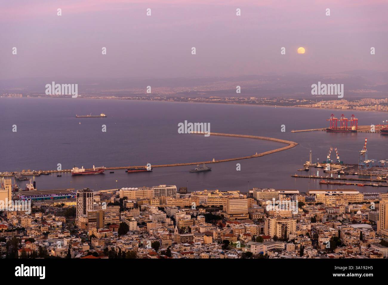 Haifa, Israel – March 7, 2025, Twilight view of the lower city and port ...