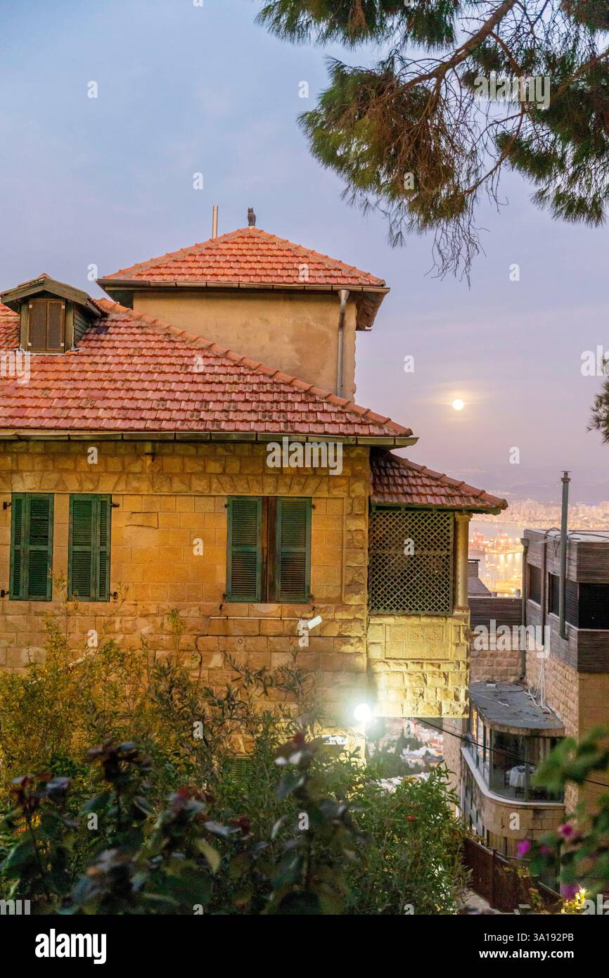 Haifa, Israel – March 7, 2025, View of an old house with a tiled roof ...