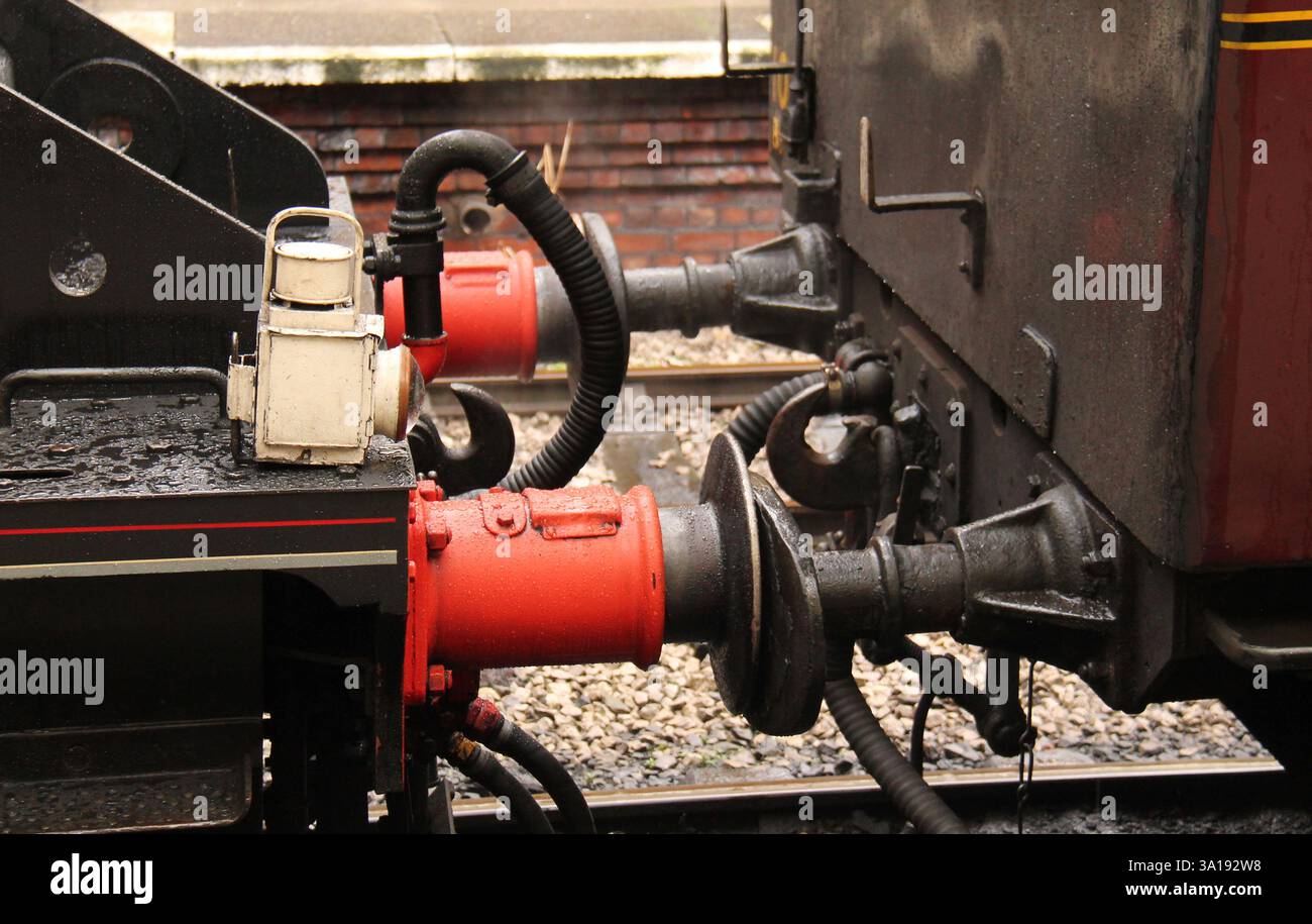 The Couplings Between a Vintage Steam Train and Carriage Stock Photo ...