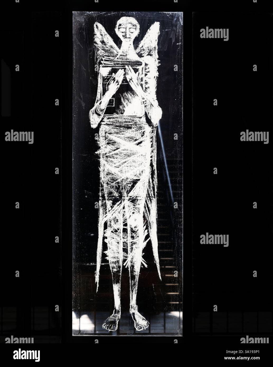 Depiction, of an angel with book, on the etched west glass window at ...