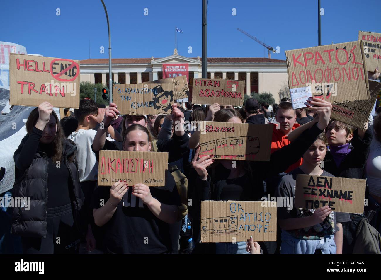Athens, Greece, 7 March 2025. Students hold pacards with slogans during ...