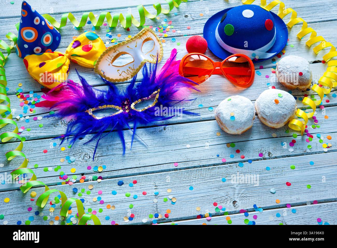 Colorful carnival background with party accessory, streamers and ...