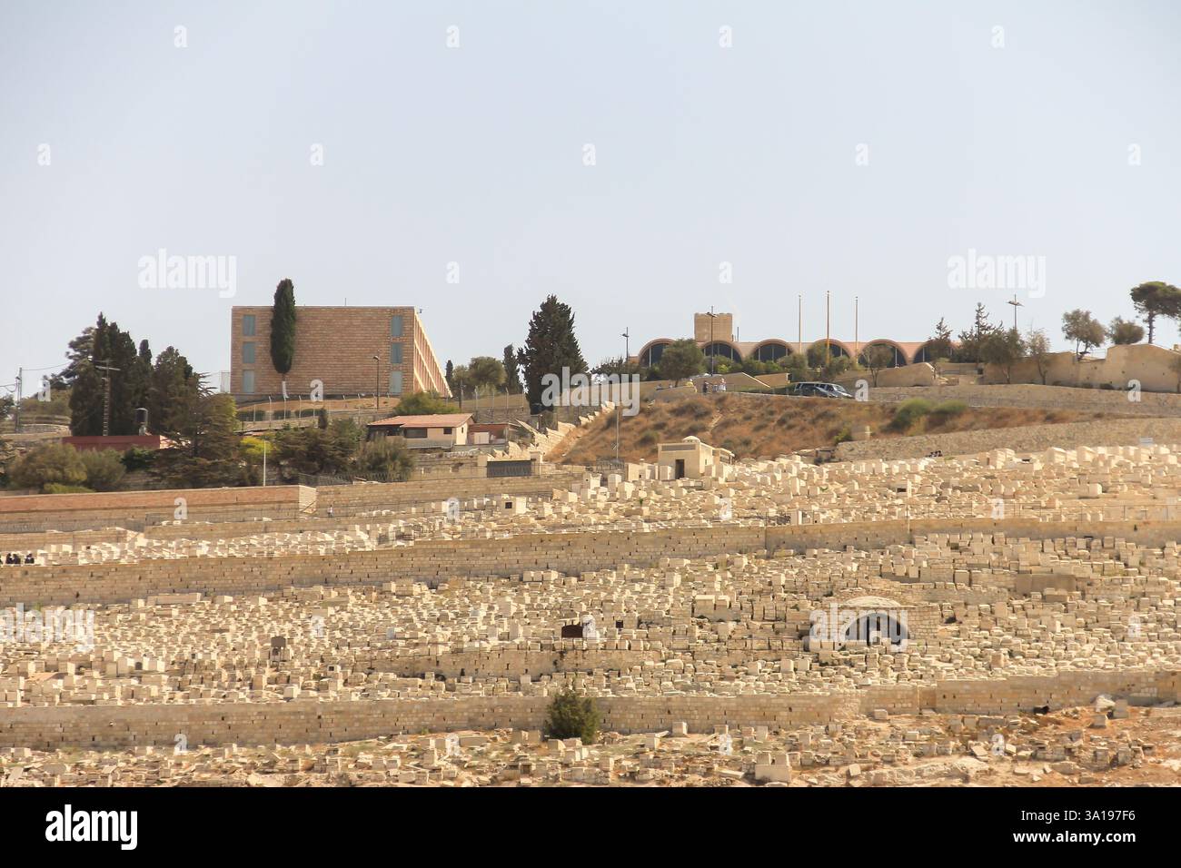 Landscape featuring vast historic cemetery with stone tombstones and ...