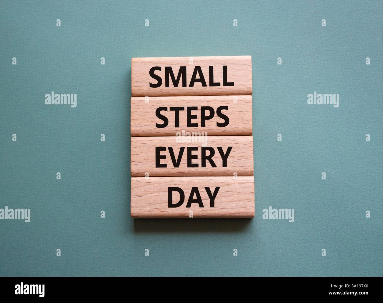 Small Steps Every Day symbol. Wooden blocks with words Small Steps ...