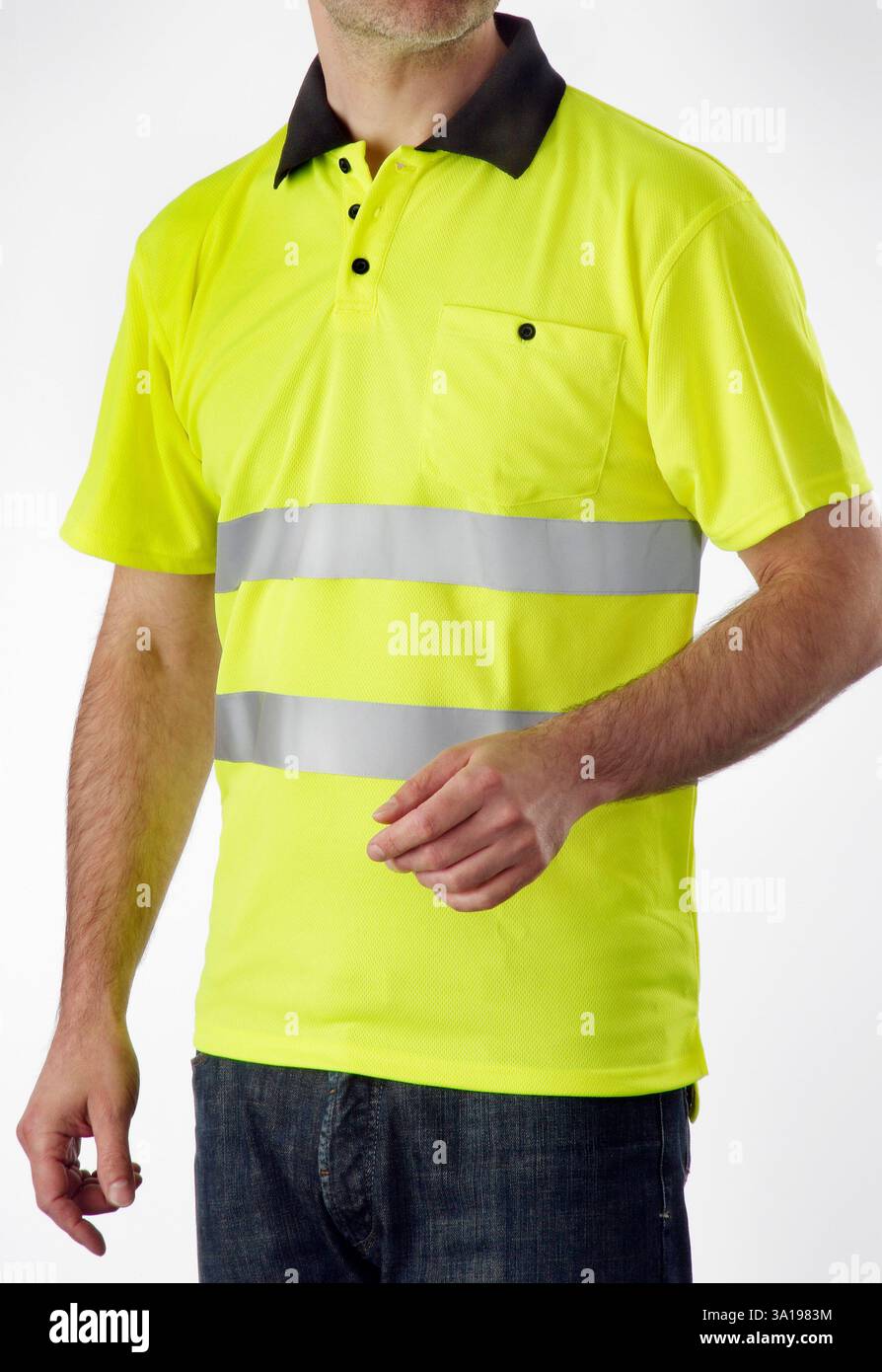 Man in bright yellow shirt hi-res stock photography and images - Alamy