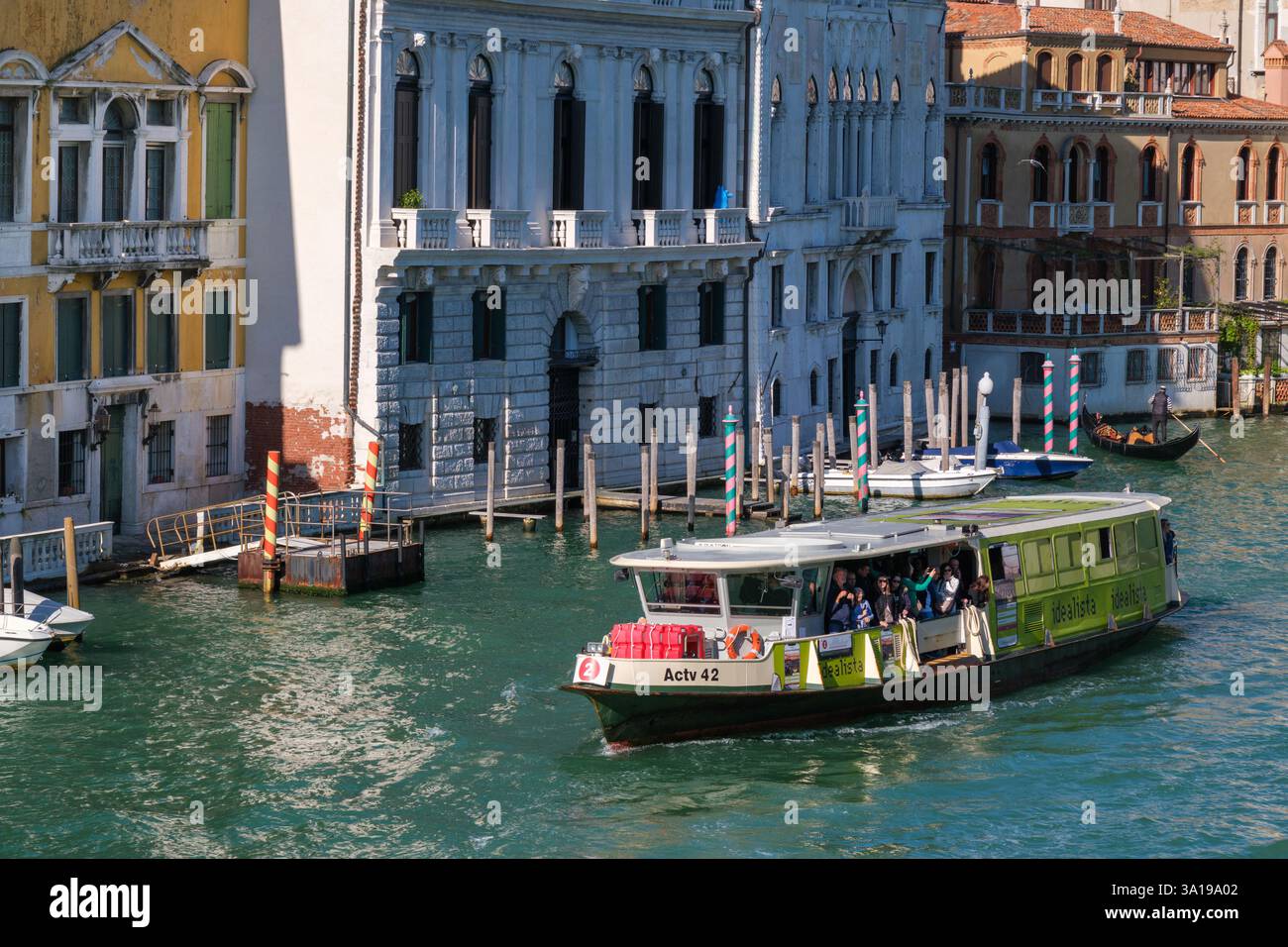 Venice, Italy - 12 October 2024: A Vaporetto ferry navigates the Grand ...
