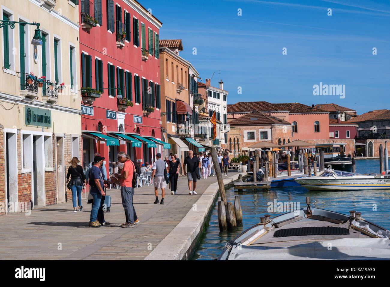 Venice, Italy - 12 October 2024: Tourists stroll along Murano’s lively ...