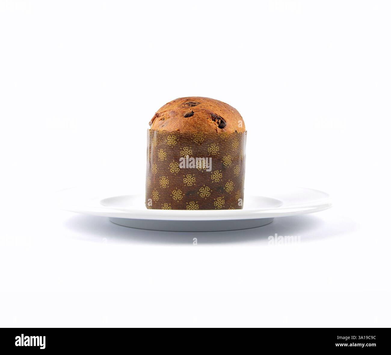 Chocolate muffin in paper form on a plate and white background Stock ...