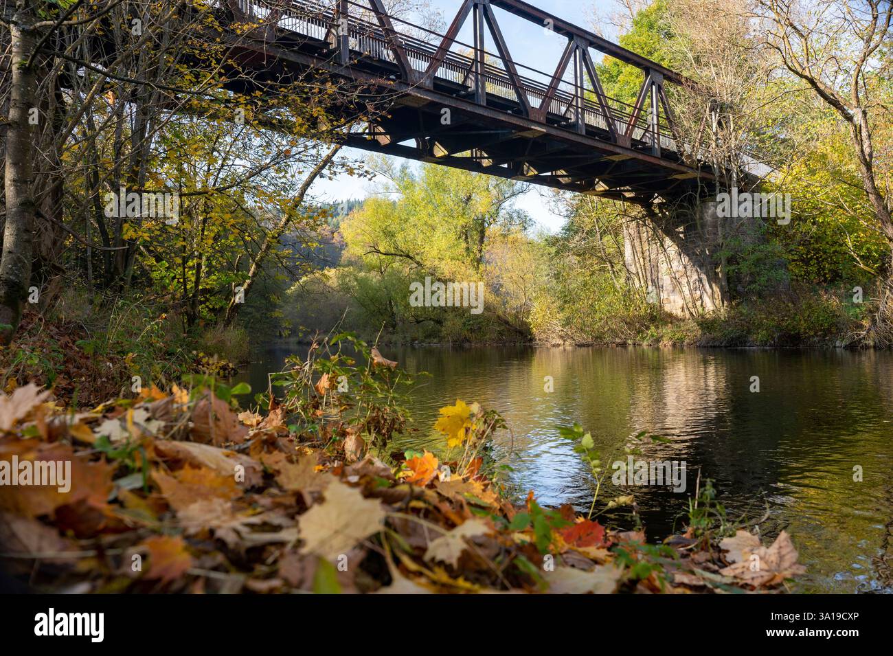 Old iron bridge over the river Eder in Hesse, Germany. With nature and ...