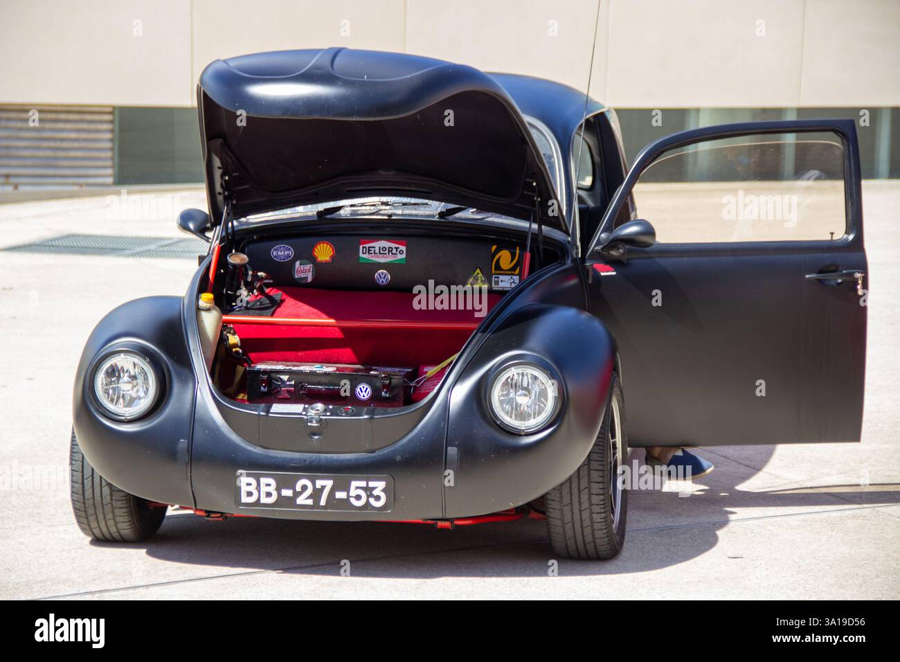 Classic volkswagen beetle showcasing custom modifications, open hood ...