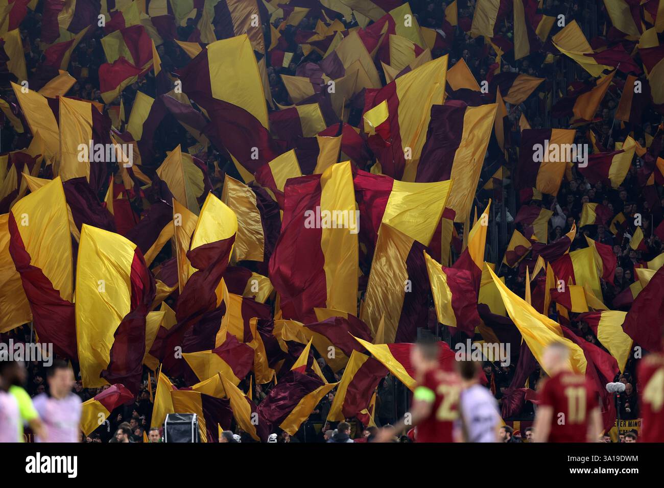 Rome, Italy 6.03.2025: choreography with the yellow and red flags of ...
