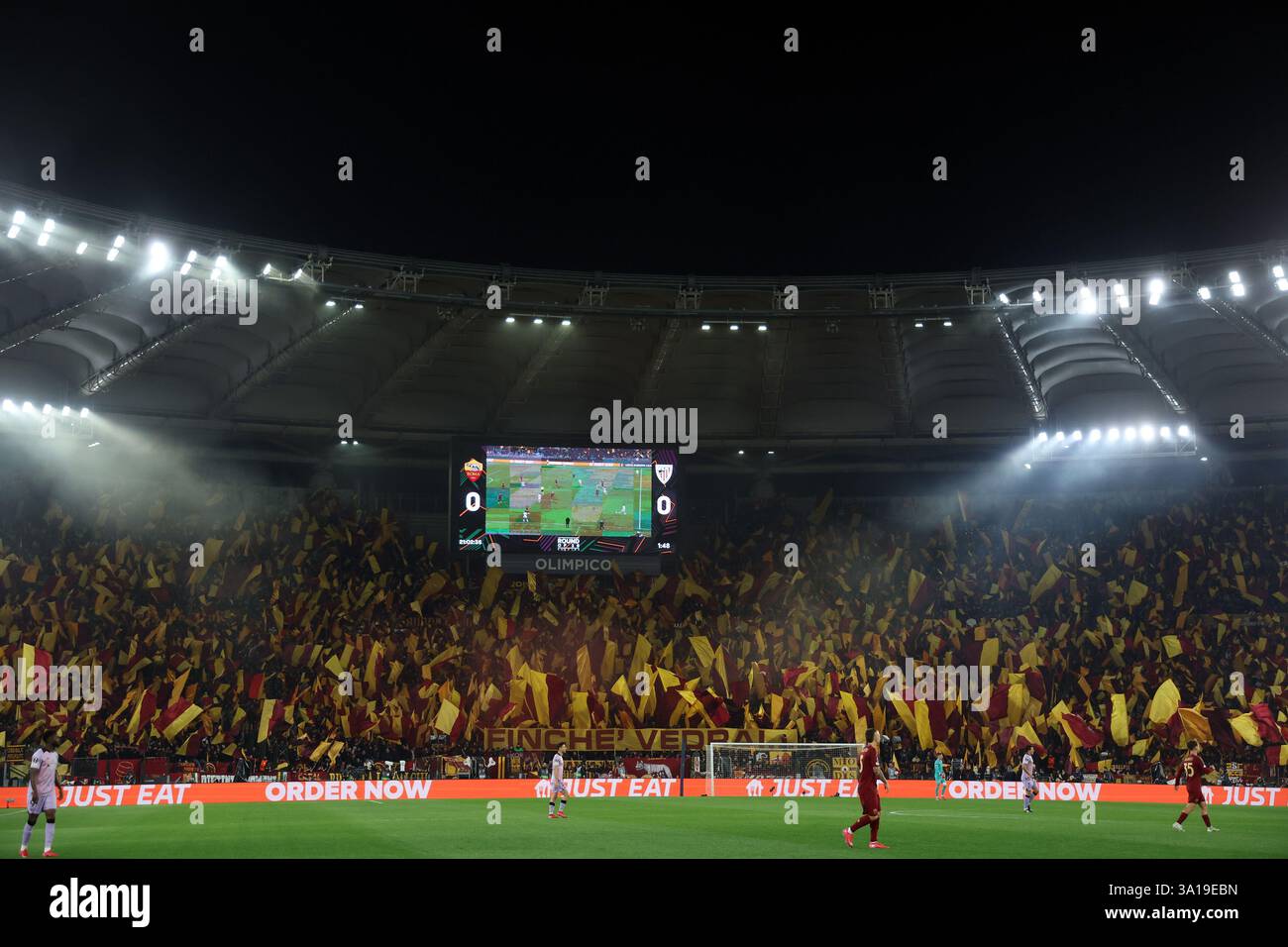 Rome, Italy 6.03.2025: choreography with the yellow and red flags of ...