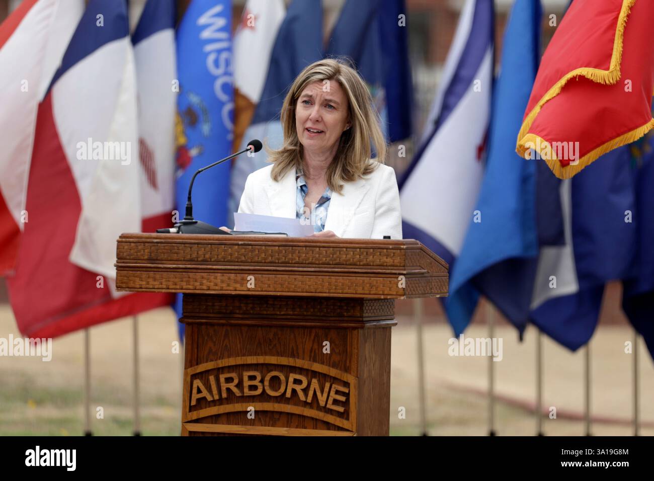 Rebecca Amirpour, granddaughter of PFC Roland Bragg, speaks as Fort ...