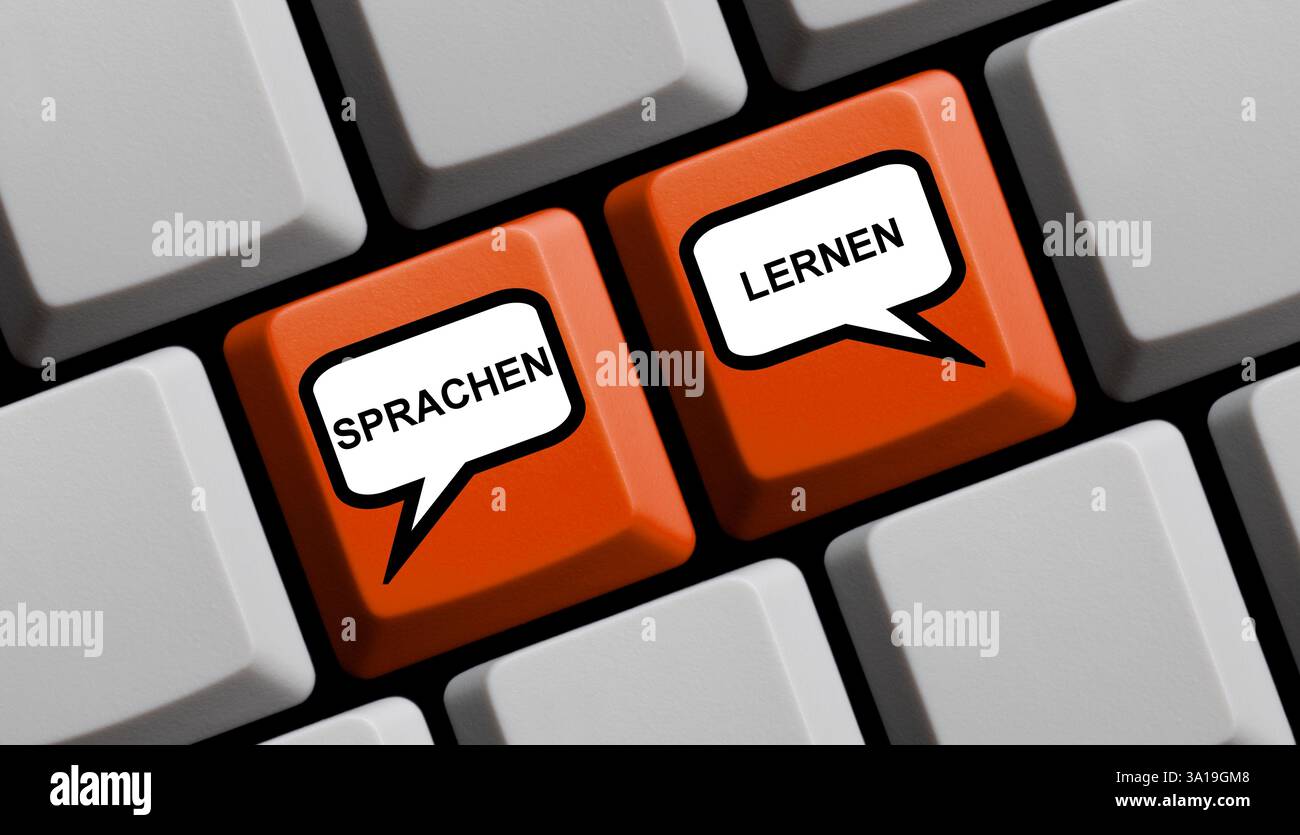 Orange keyboard with two buttons shows language learning Stock Photo ...