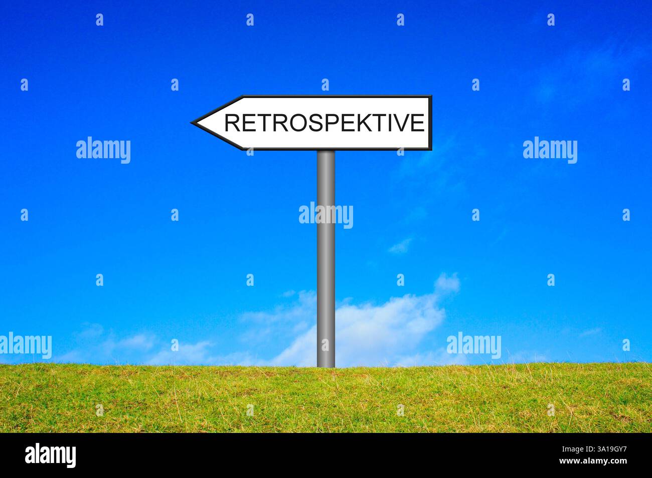 Sign on a meadow shows retrospective Stock Photo - Alamy