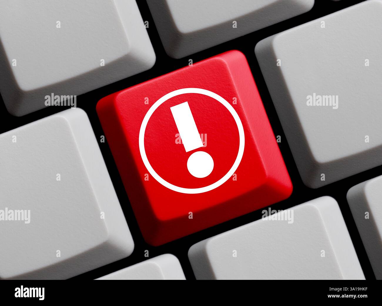 Red keyboard with exclamation mark symbol Stock Photo - Alamy