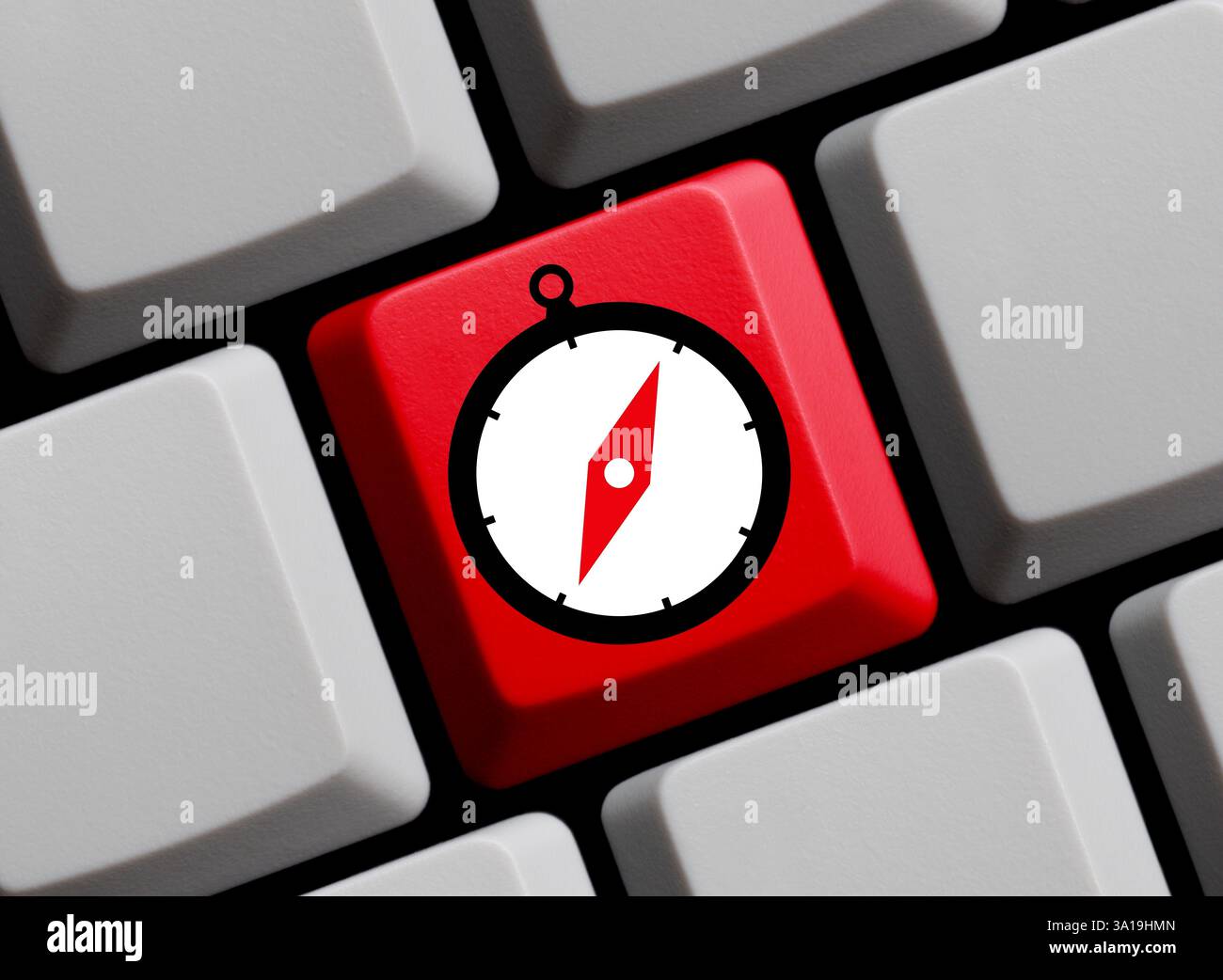 Red keypad with compass symbol Stock Photo - Alamy