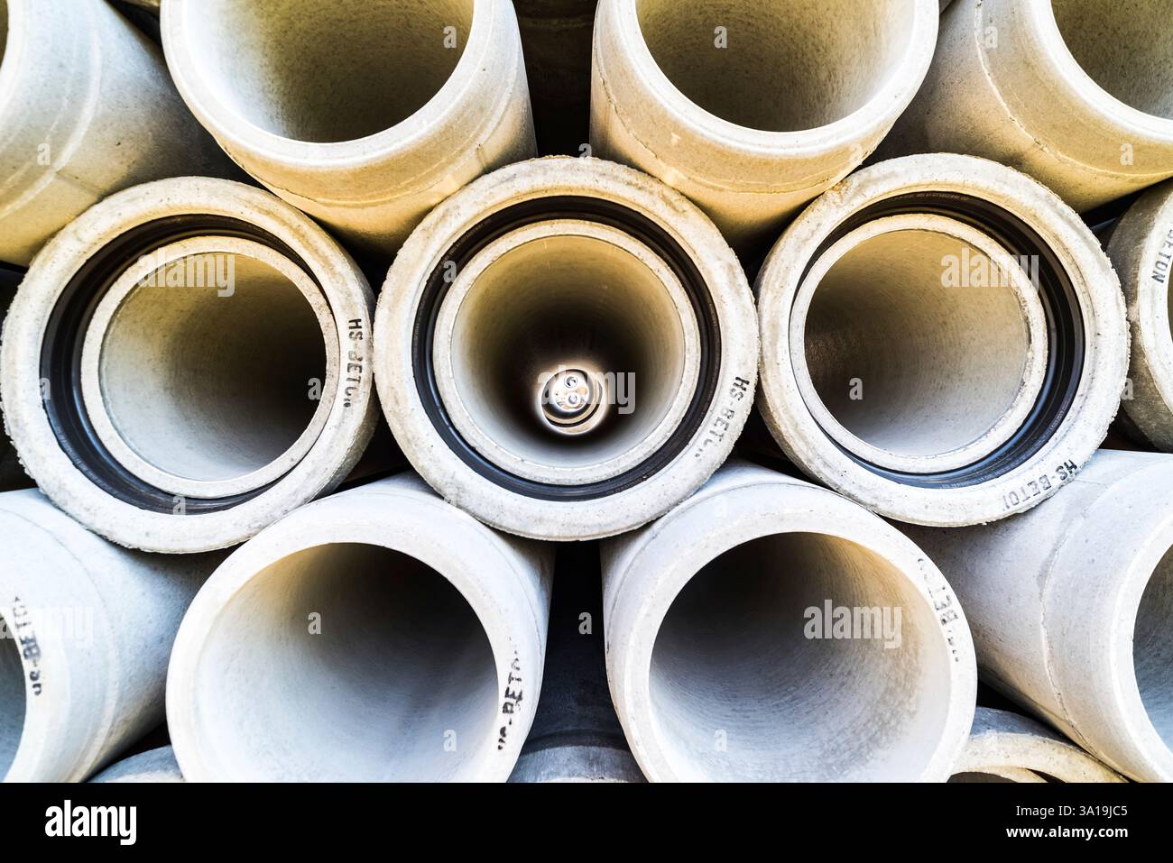 Stack with concrete pipes Stock Photo - Alamy