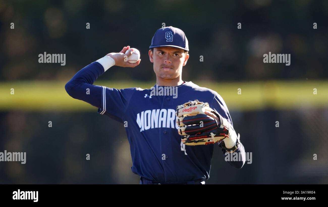 Old Dominion infielder Kyle Edwards throws during an NCAA baseball game ...