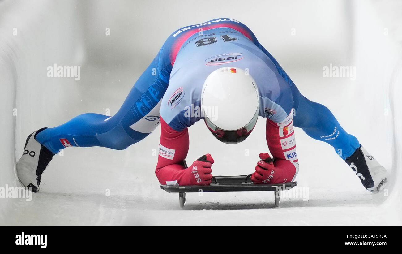 Vinzenz Buff, of Switzerland, finishes his fourth run at the skeleton ...