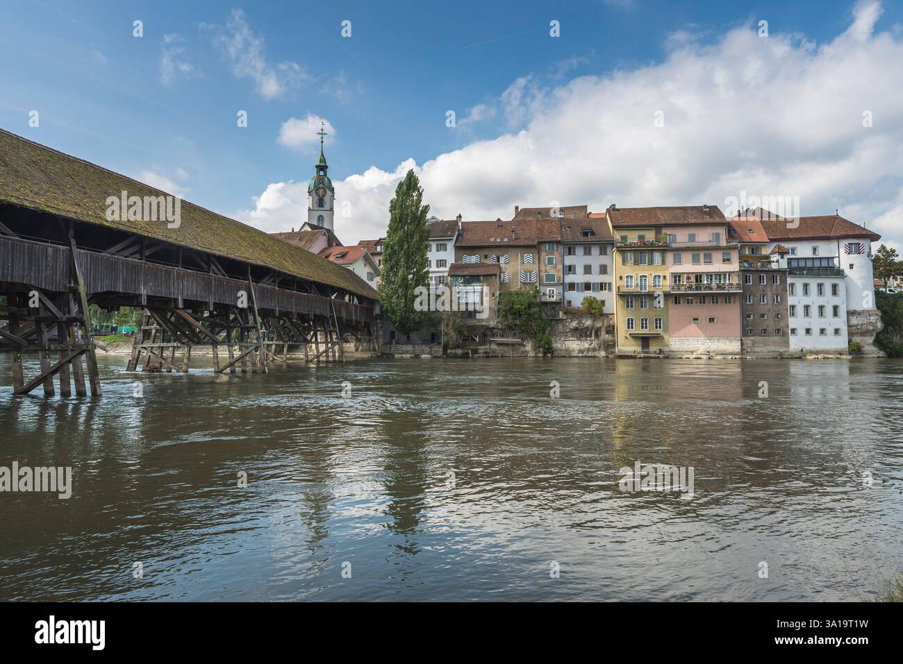 View of the Aare and the old town of Olten with historic wooden bridge ...