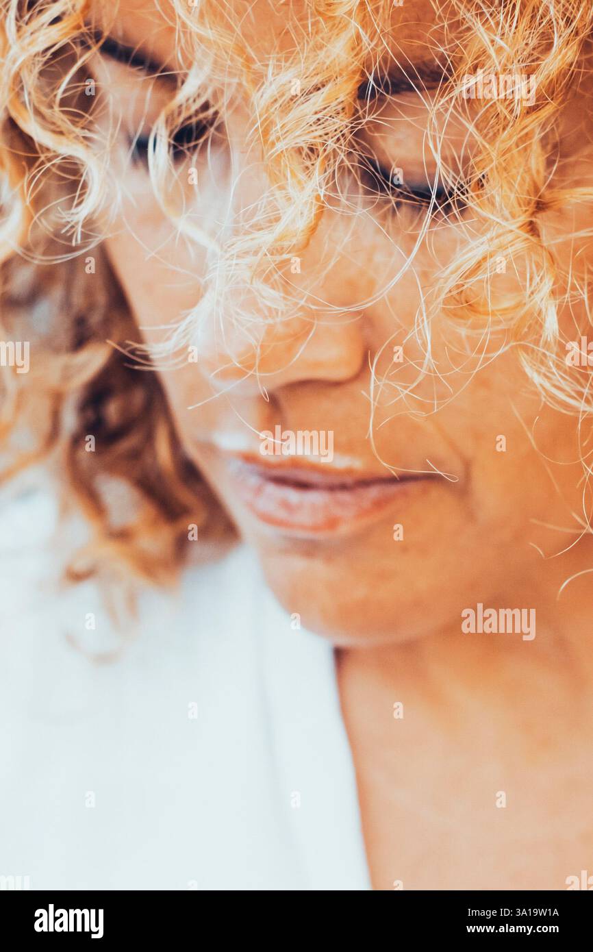 Woman looking sad downward hi-res stock photography and images - Alamy