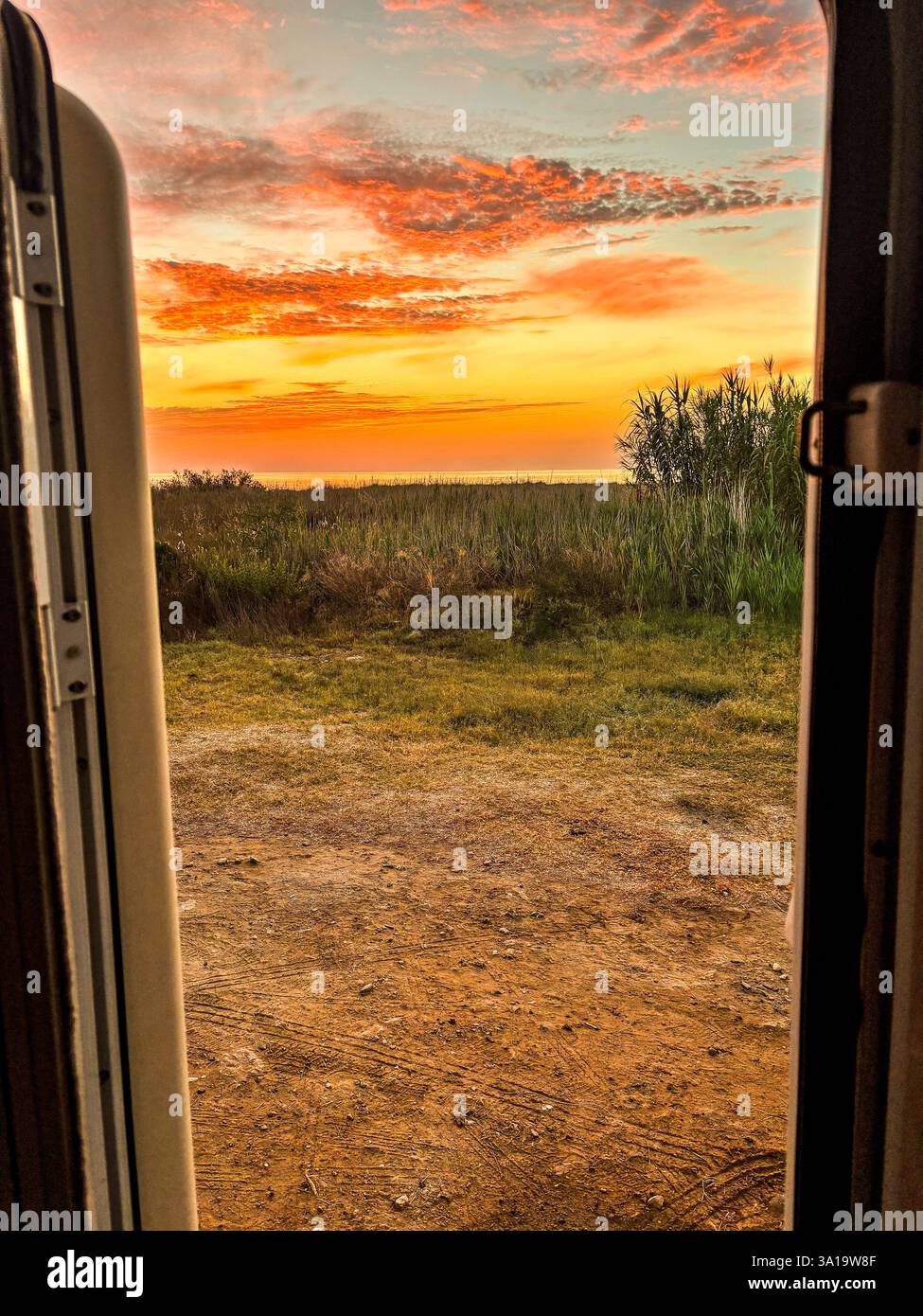 Amazing sunset sky view from camper van open door. Concept of travel ...