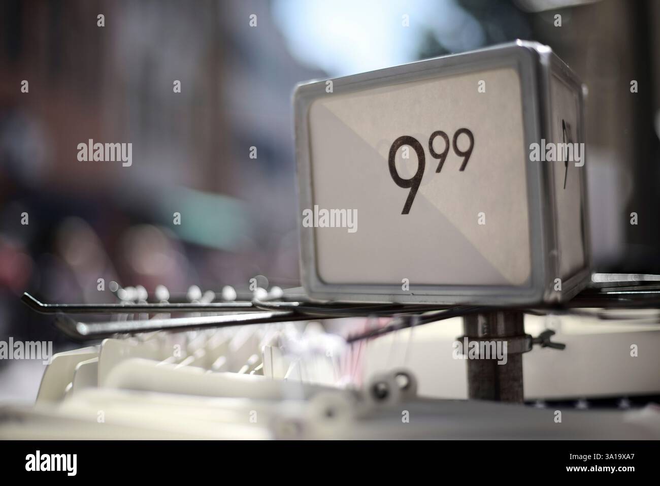 Display stand with threshold price tag in pedestrian shopping area ...